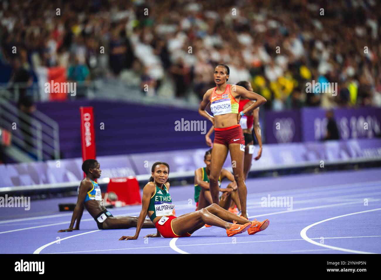 Sembo Almayew participating in the 3000 metres steeplechase at the ...