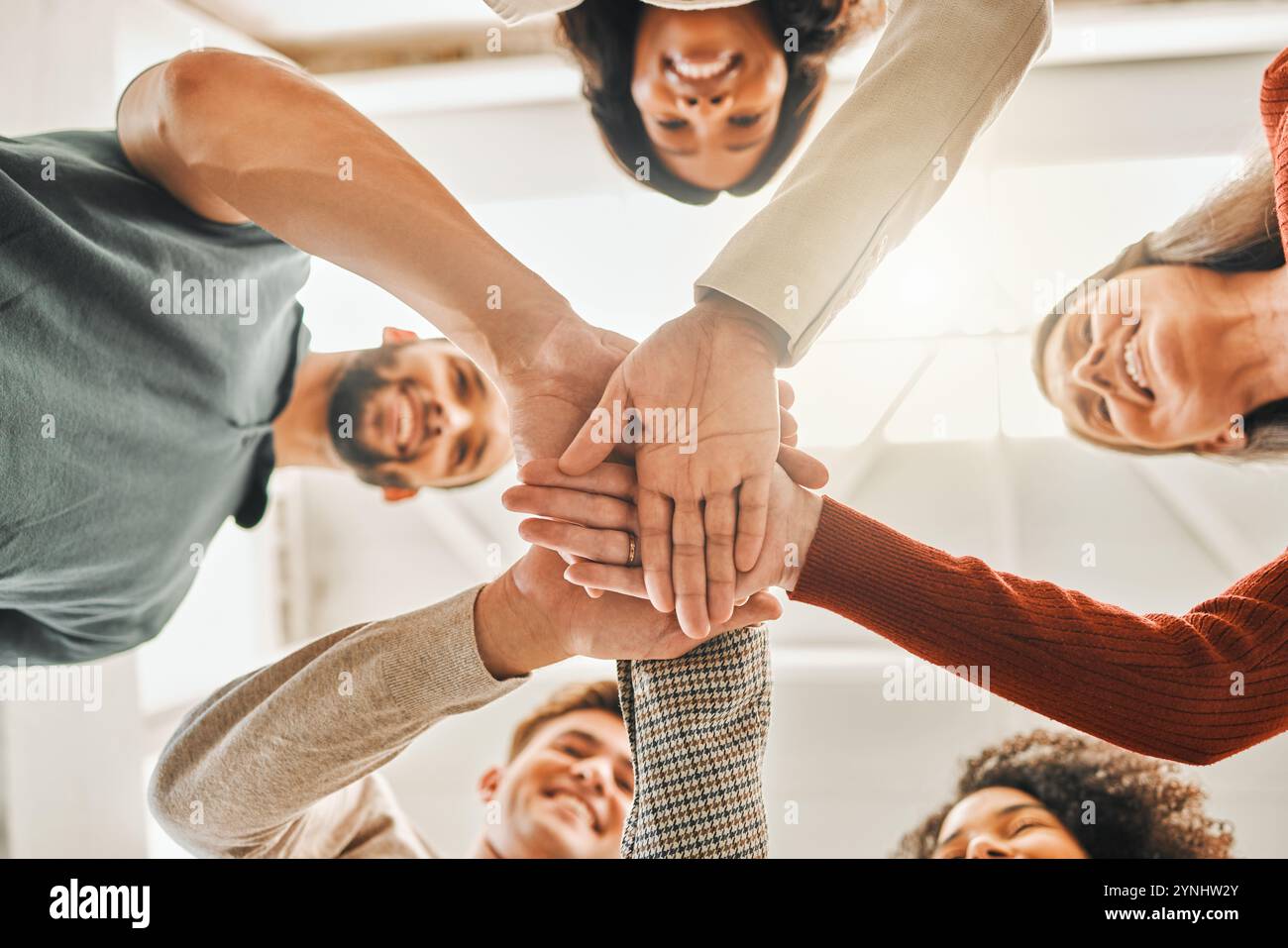 Business people, hands and stack in office for solidarity, low angle ...