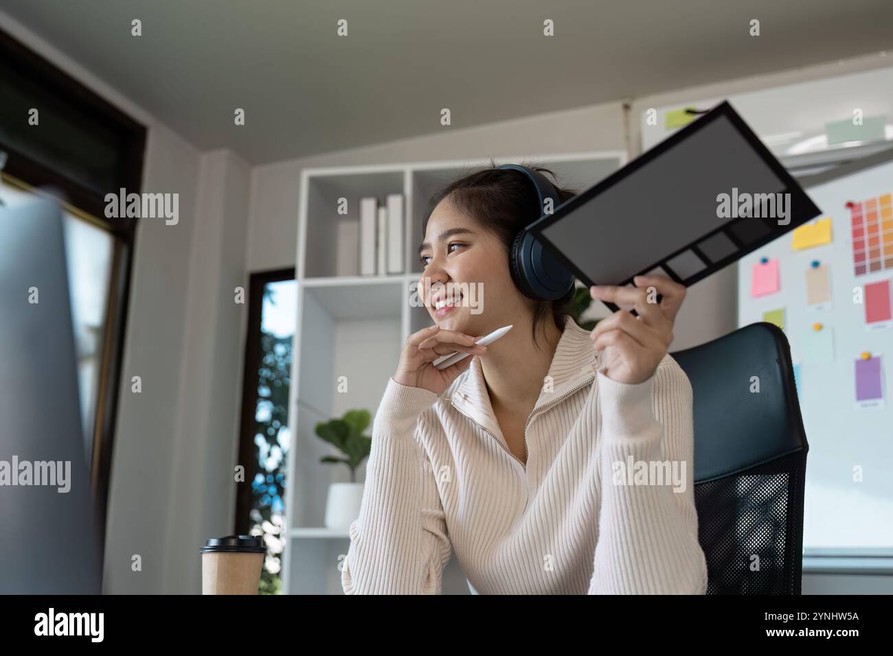 Creative Graphic Designer at Work in Modern Office with Digital Tools ...