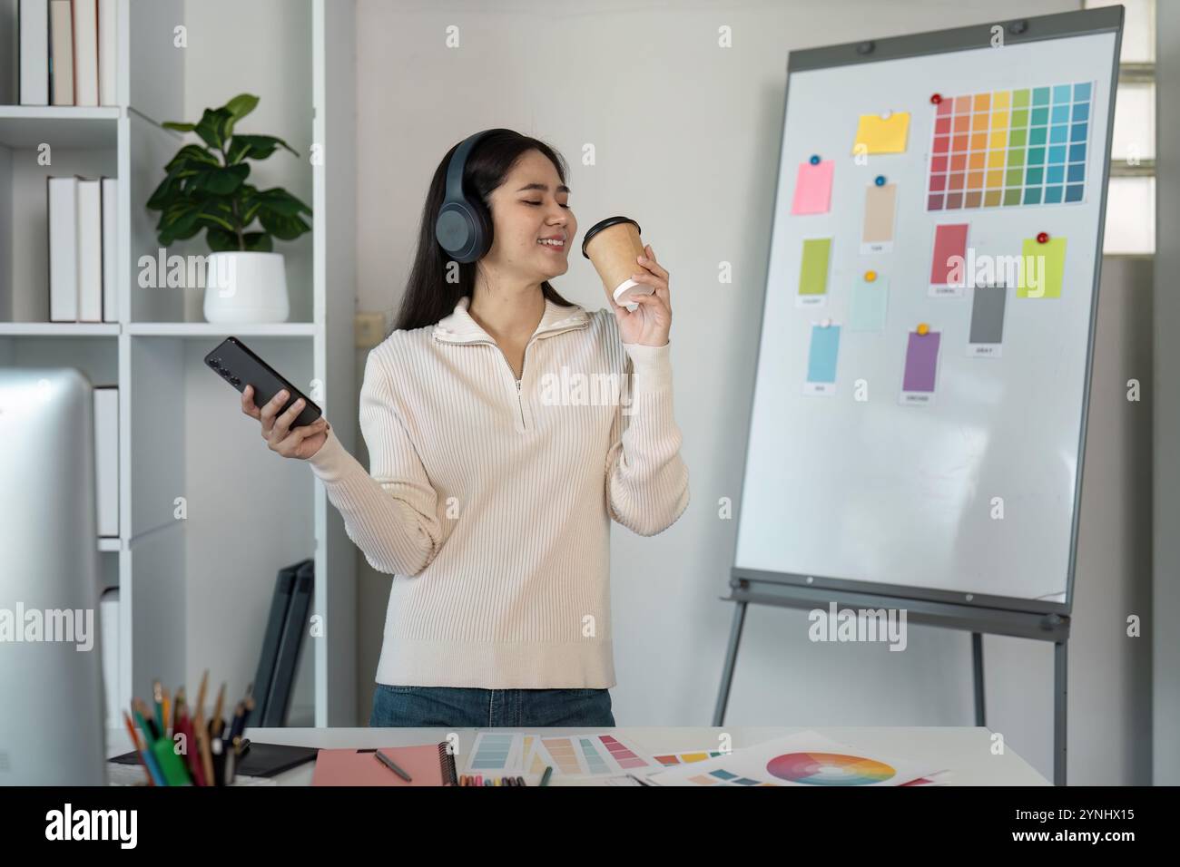 Creative Graphic Designer at Work in Modern Office with Digital Tools ...