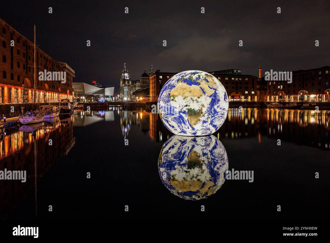Floating Earth on display at Liverpool's Albert Dock Stock Photo - Alamy