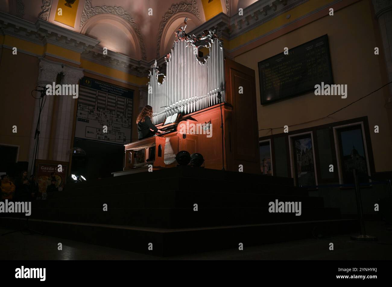 LVIV, UKRAINE - NOVEMBER 22, 2024 - Musician Olesia Barsuk plays the ...