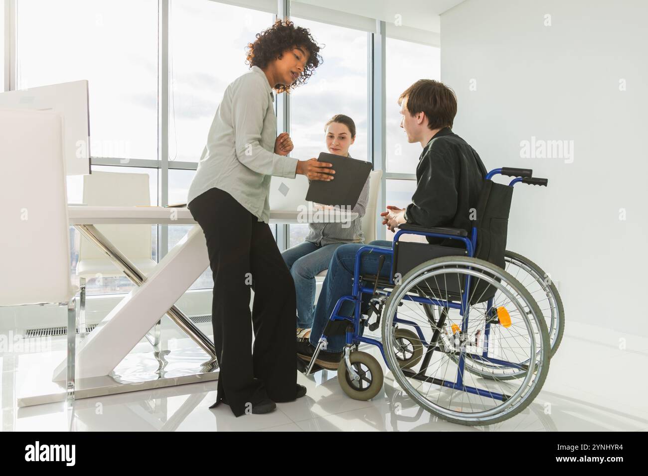 Teamwork brainstorm. Diverse multiracial colleagues man in chair for ...