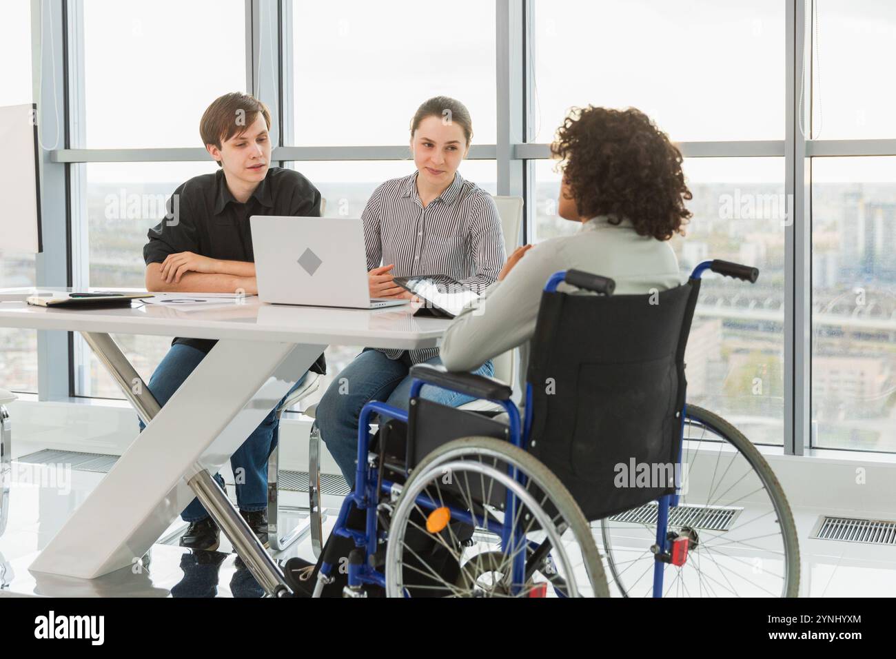 Teamwork brainstorm. Diverse multiracial colleagues woman in chair for ...