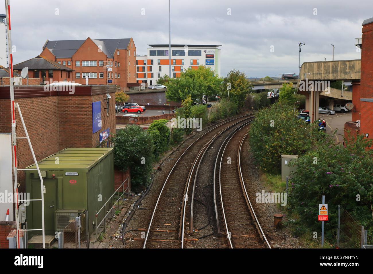 Poole, Dorset, England. 2nd October 2024. The railway line bending past ...