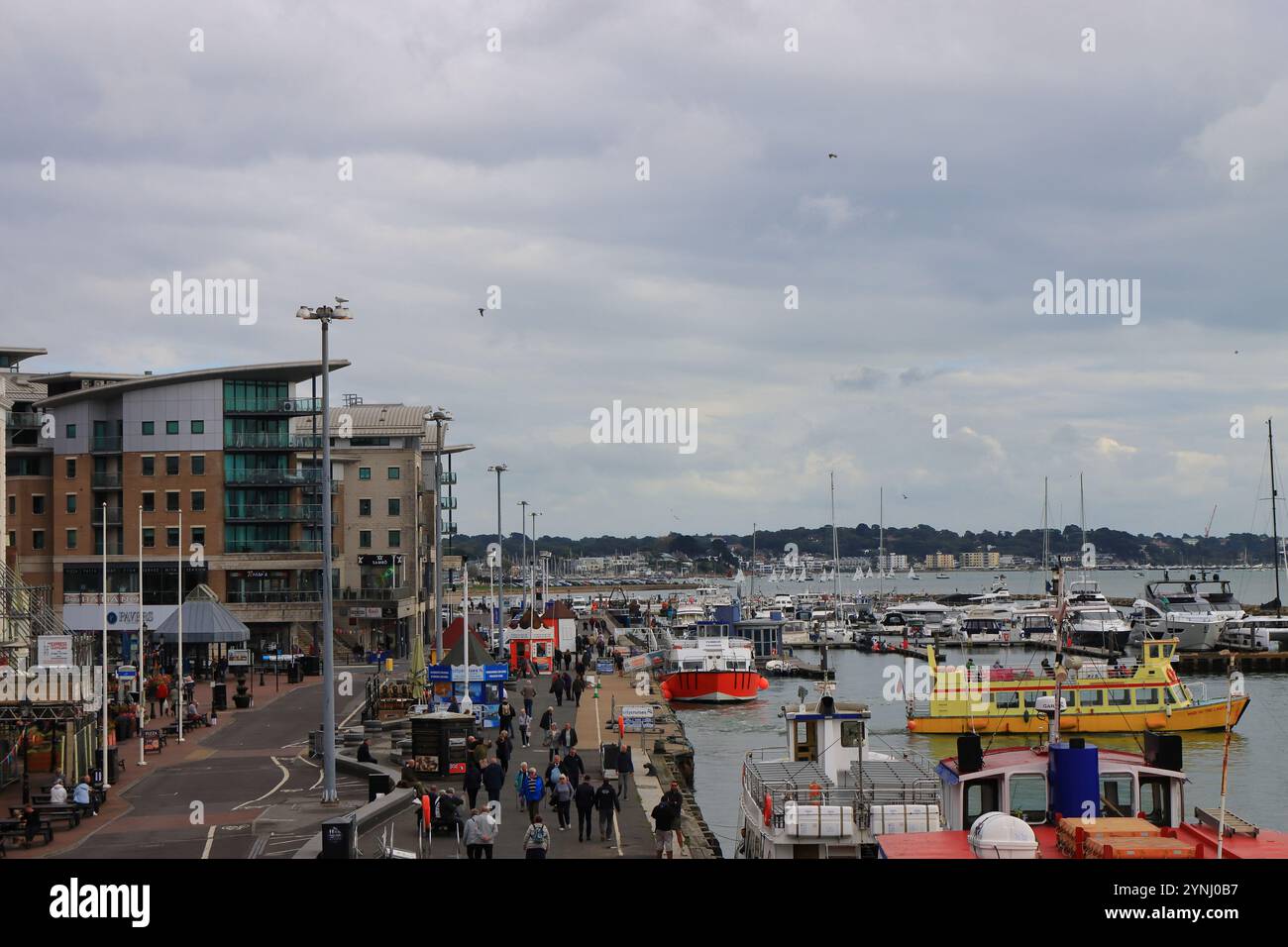 Poole, Dorset, England. 2nd October 2024. A busy scene in the harbour ...