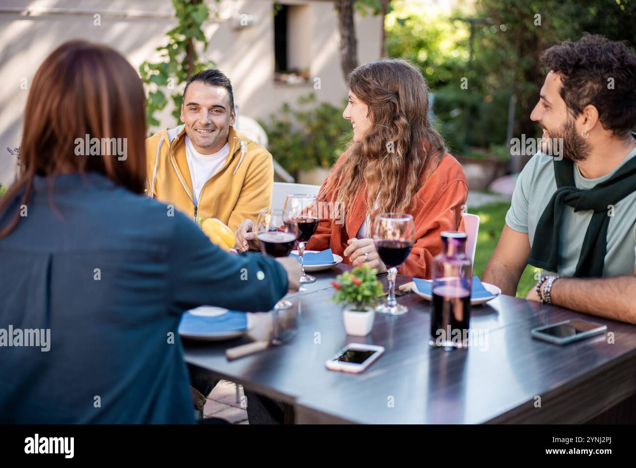 Natural interaction between diverse group of friends during casual ...