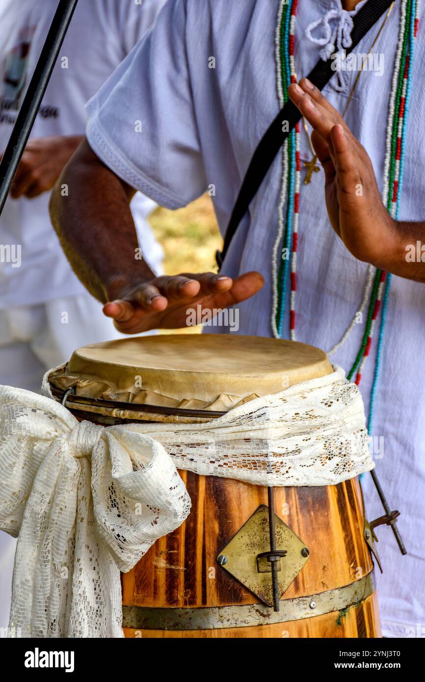 Drums decorated with fabric being used during an Umbanda ceremony in ...