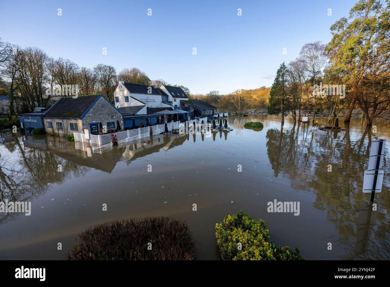 The Bathampton Mill pub near Bath in Somerset surrounded by flood water ...