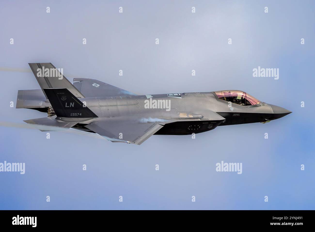 An F-35 Lightning II stealth fighter jet captured in mid-flight ...
