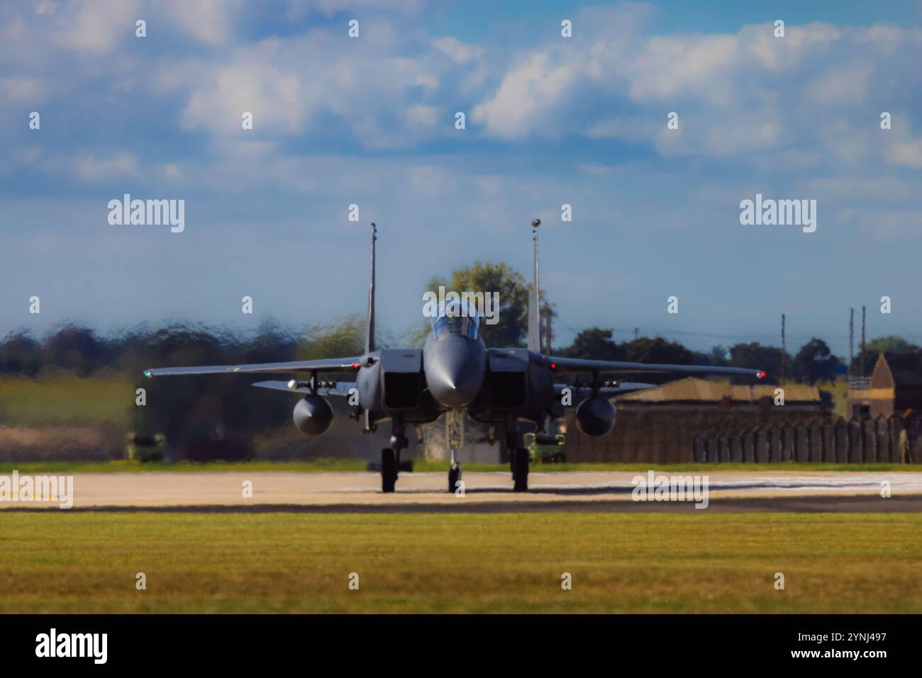 A front view of the powerful F-15 Eagle fighter jet on the runway ...