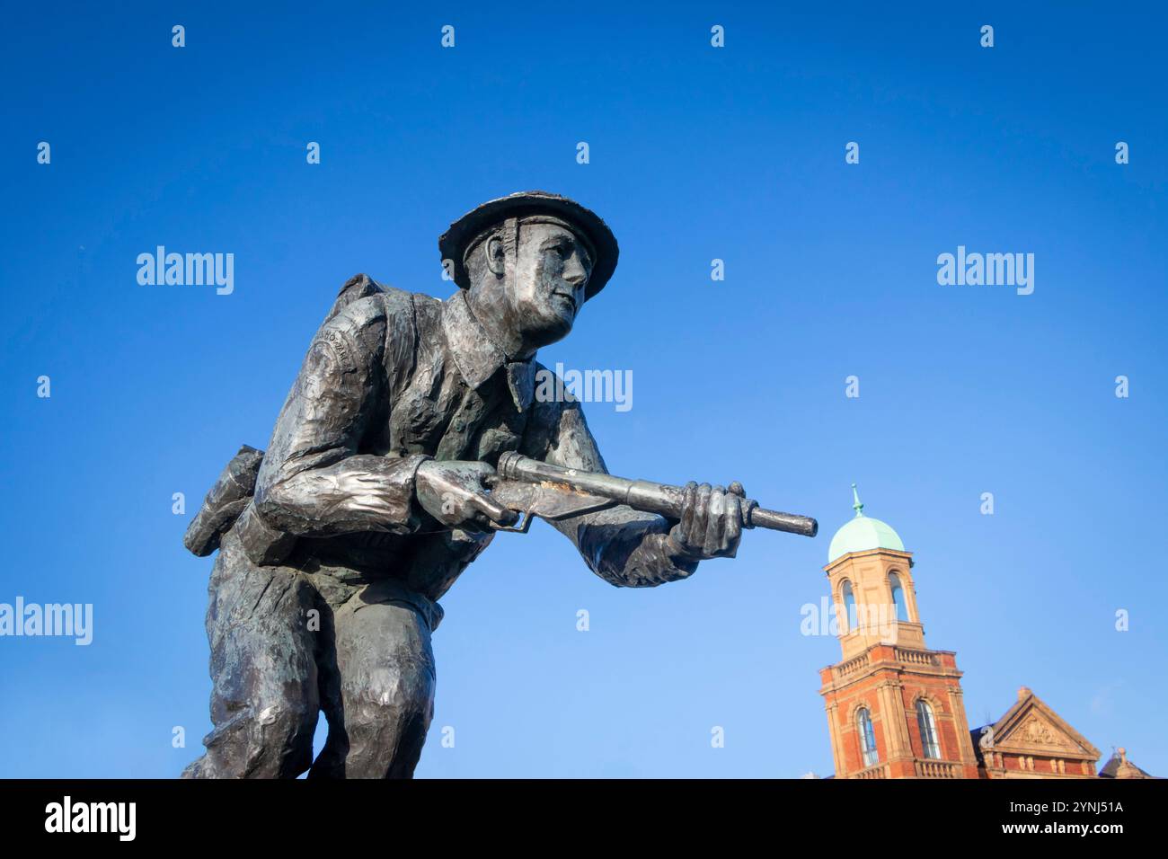 Stanley E. Hollis VC Memorial Statue of a soldier in action wearing a ...