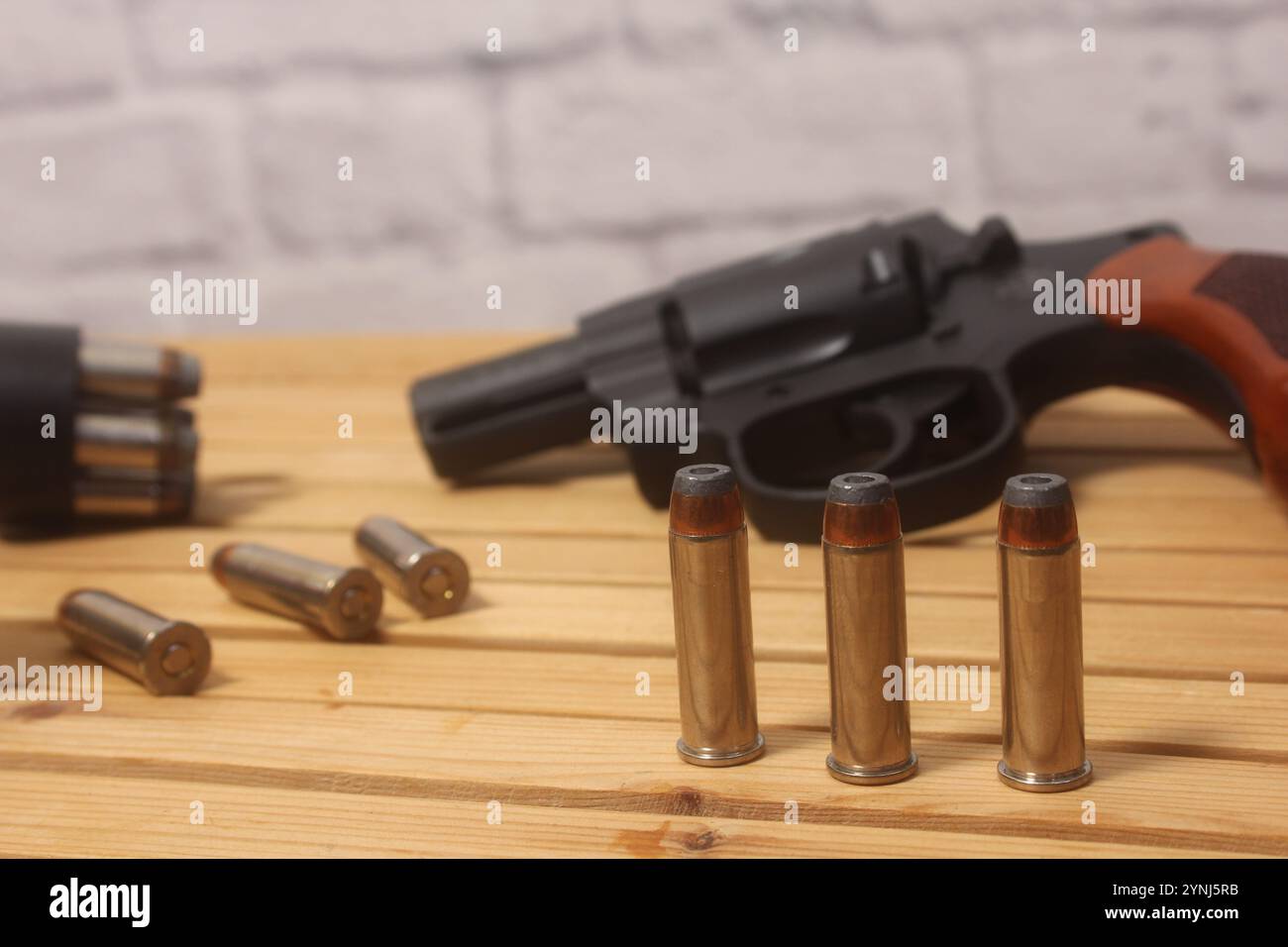 Vintage Revolver Gun With Ammo and Speed Loader Stock Photo - Alamy