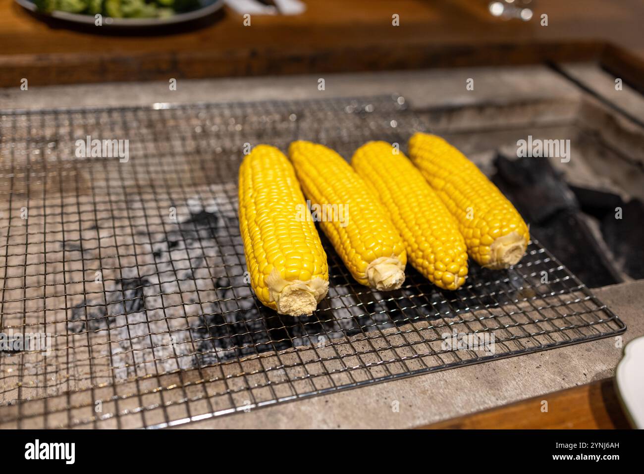 Grilled Corn on the Cob Over Charcoal on Mesh – Rustic Cooking Stock ...