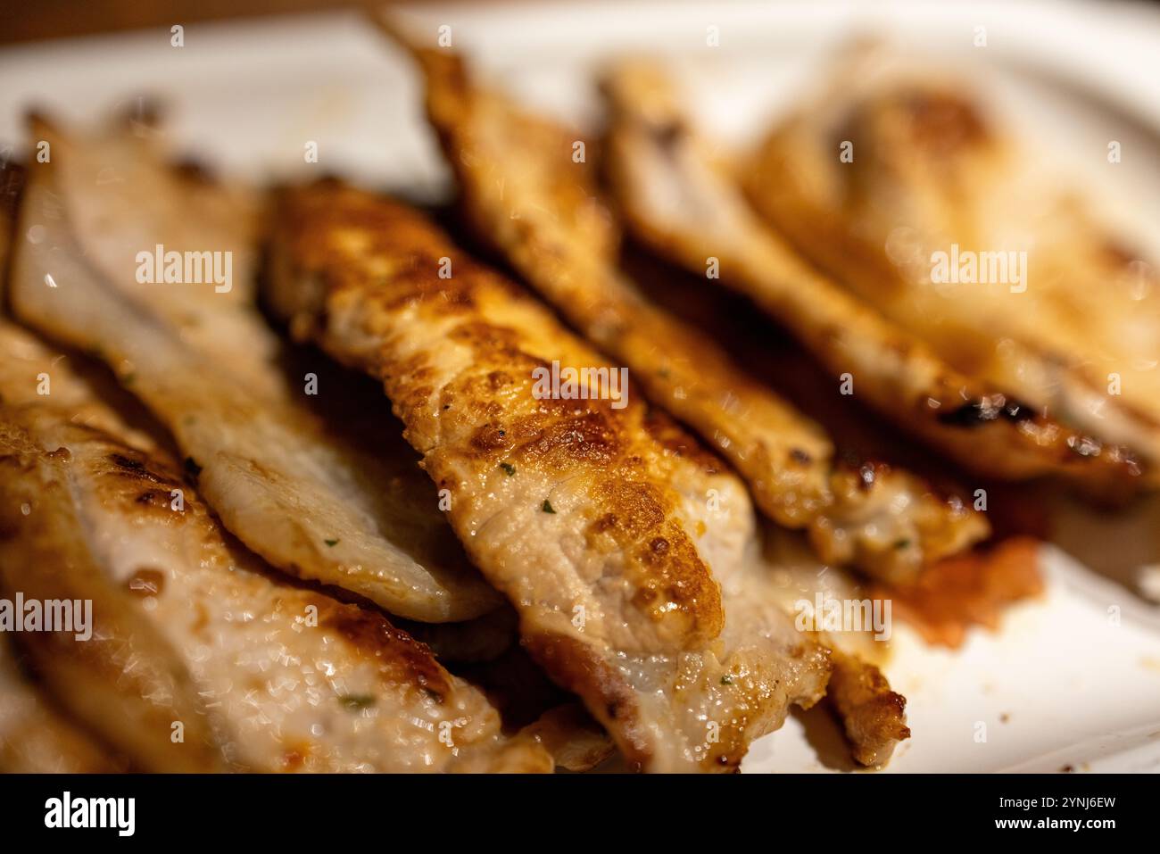 Grilled chicken fillets on plate hi-res stock photography and images ...