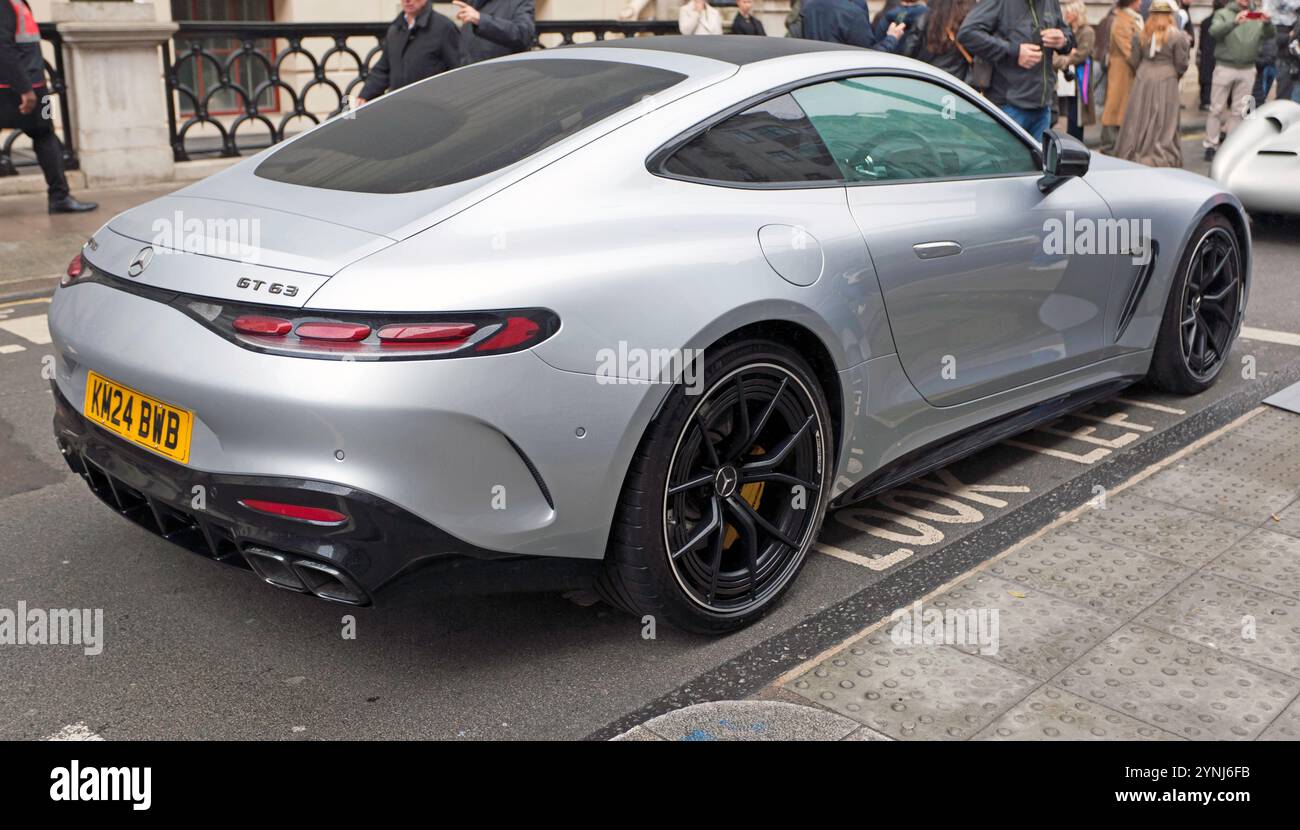 Three-quarters rear view of the new Silver, 2024, Mercedes AMG Coupe ...