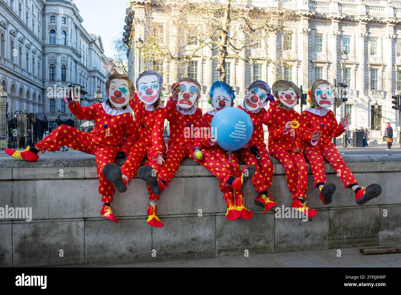 London, England, UK. 26th Nov, 2024. PETA activists dressed as clowns ...