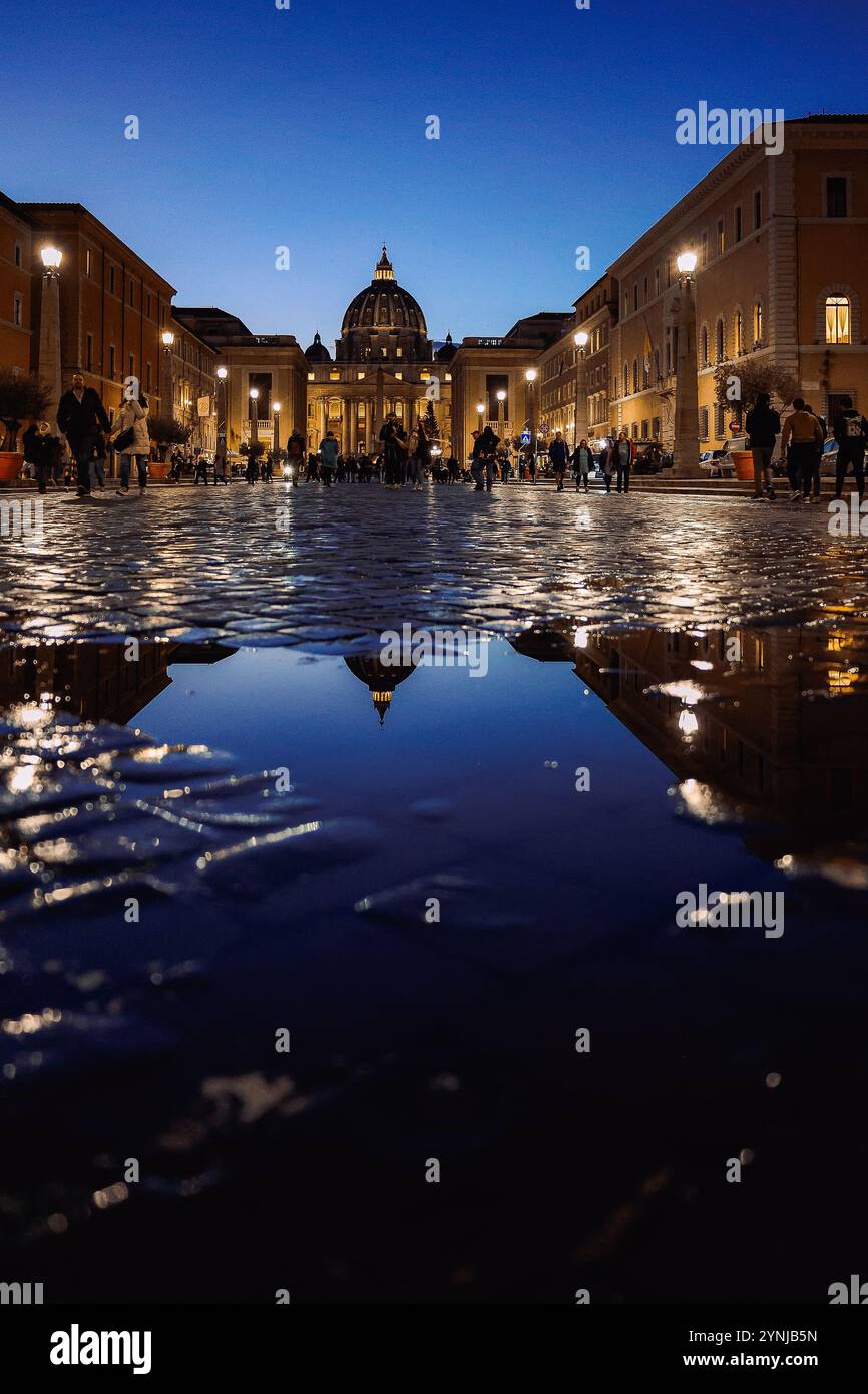 Panoramic night view of St Peter's Basilica with beautiful reflection ...