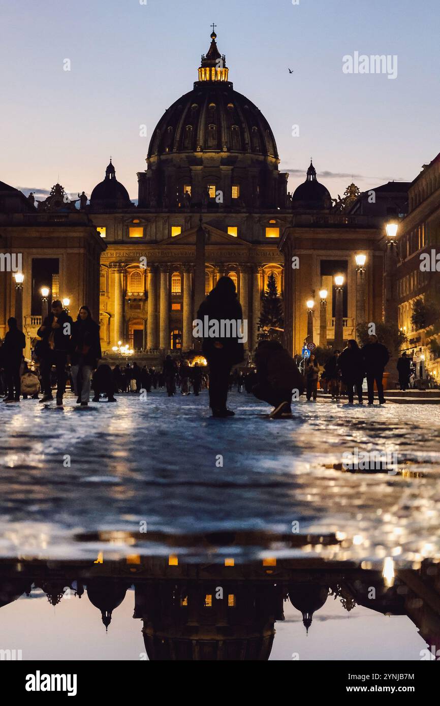 Panoramic night view of St Peter's Basilica with beautiful reflection ...