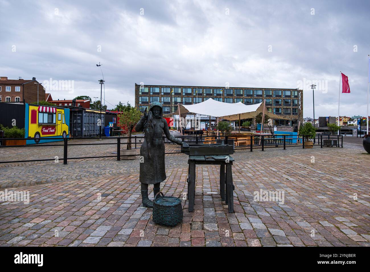 Sculpture of a fish woman on Fisktorget in the city harbour of ...