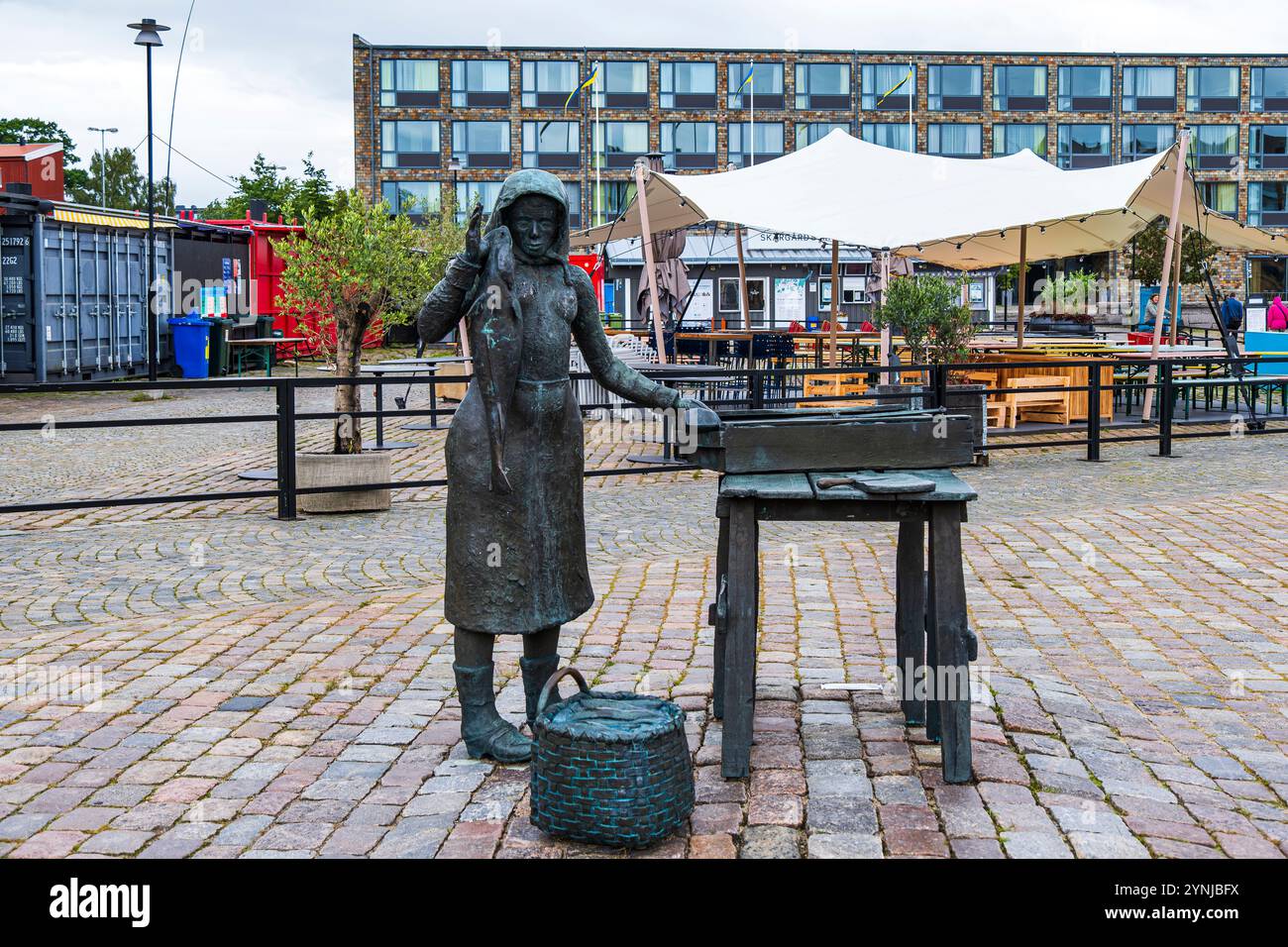 Sculpture of a fish woman on Fisktorget in the city harbour of ...