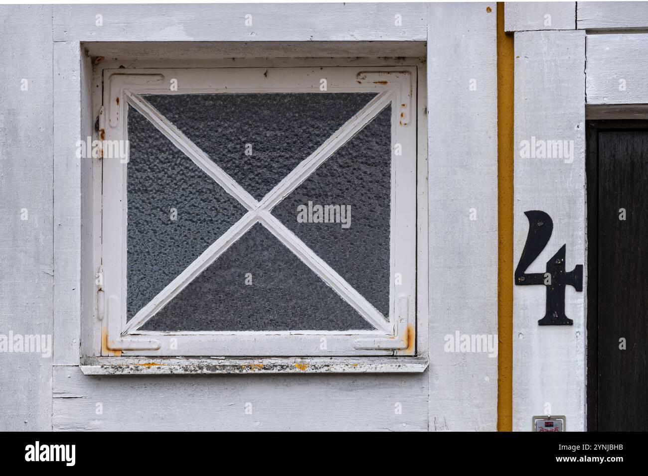 The number 4 on a front door next to a window, Karlskrona, Blekinge län ...