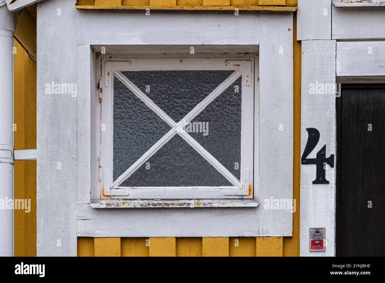 The number 4 on a front door next to a window, Karlskrona, Blekinge län ...