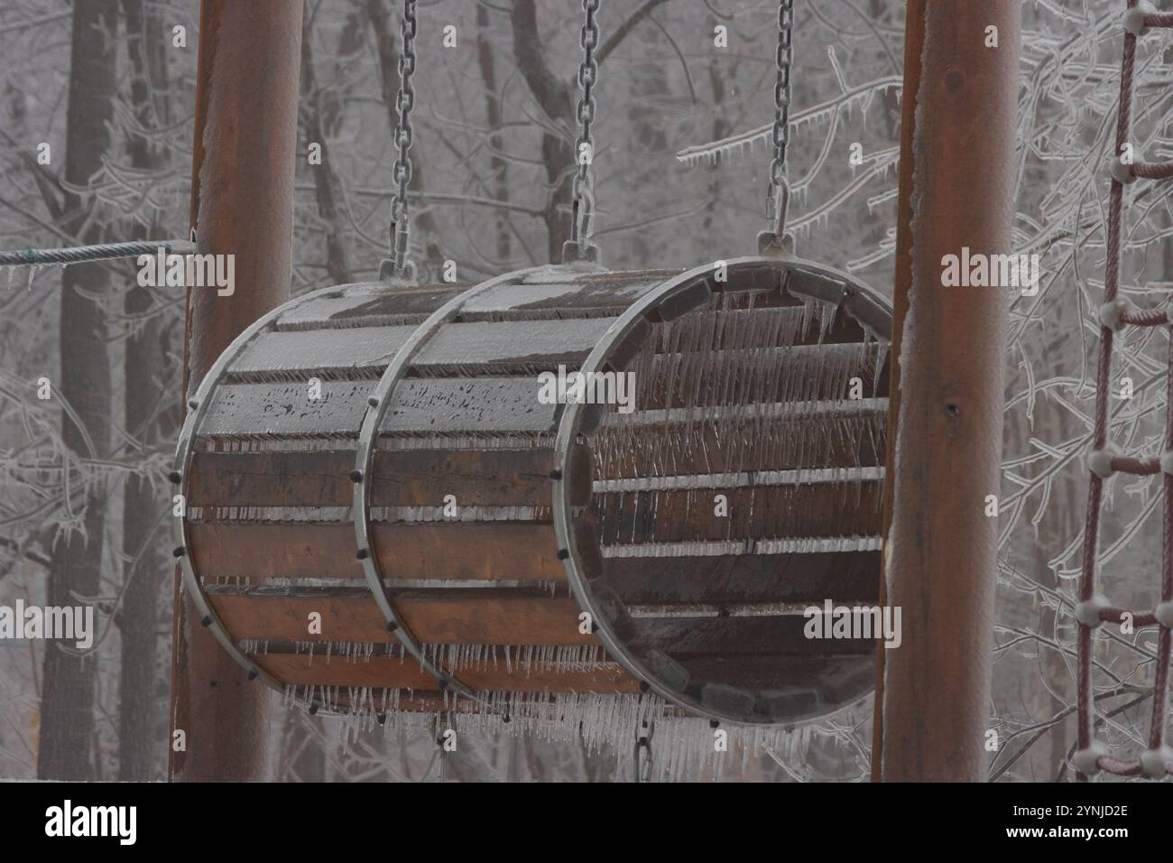 A play structure becomes encased in ice after a winter storm Stock ...