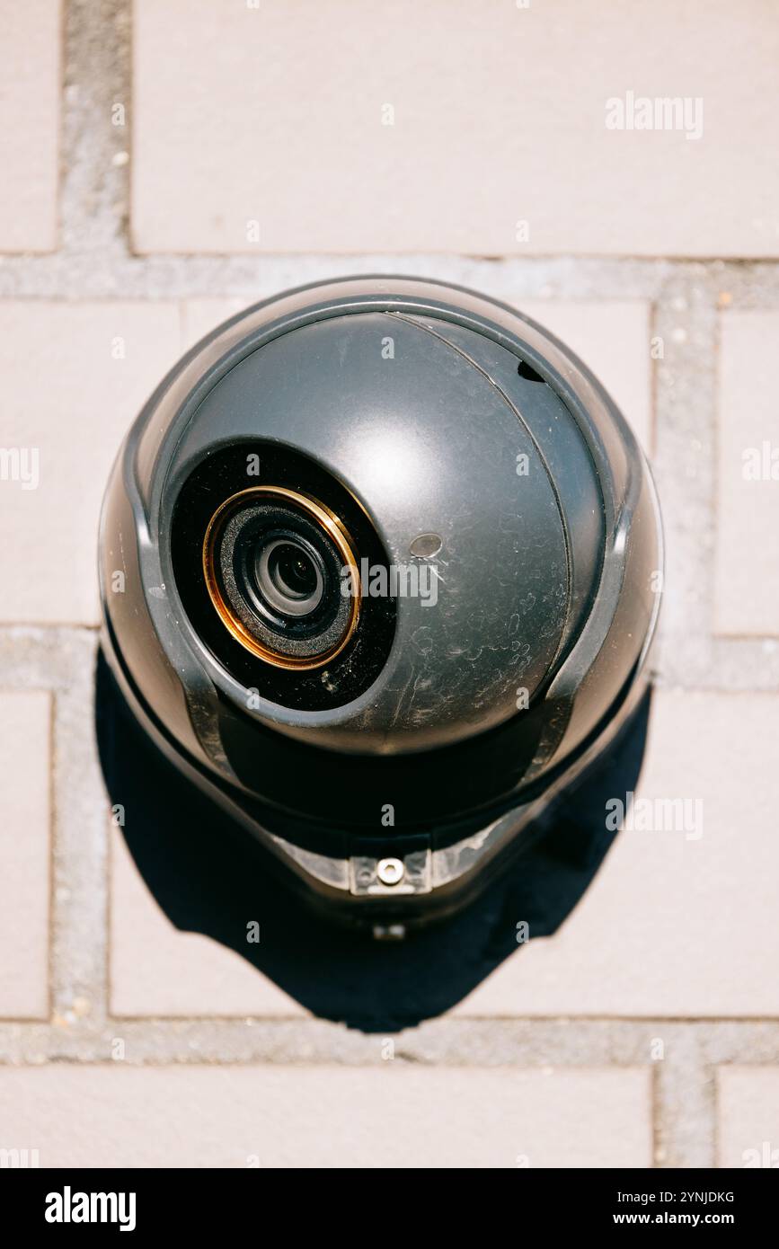 surveillance camera on the building facade Stock Photo - Alamy