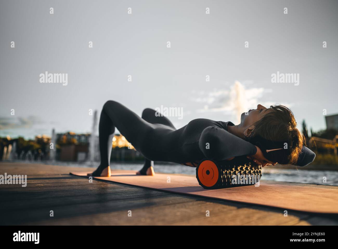 active fitness woman practicing muscular relaxation exercise with ...