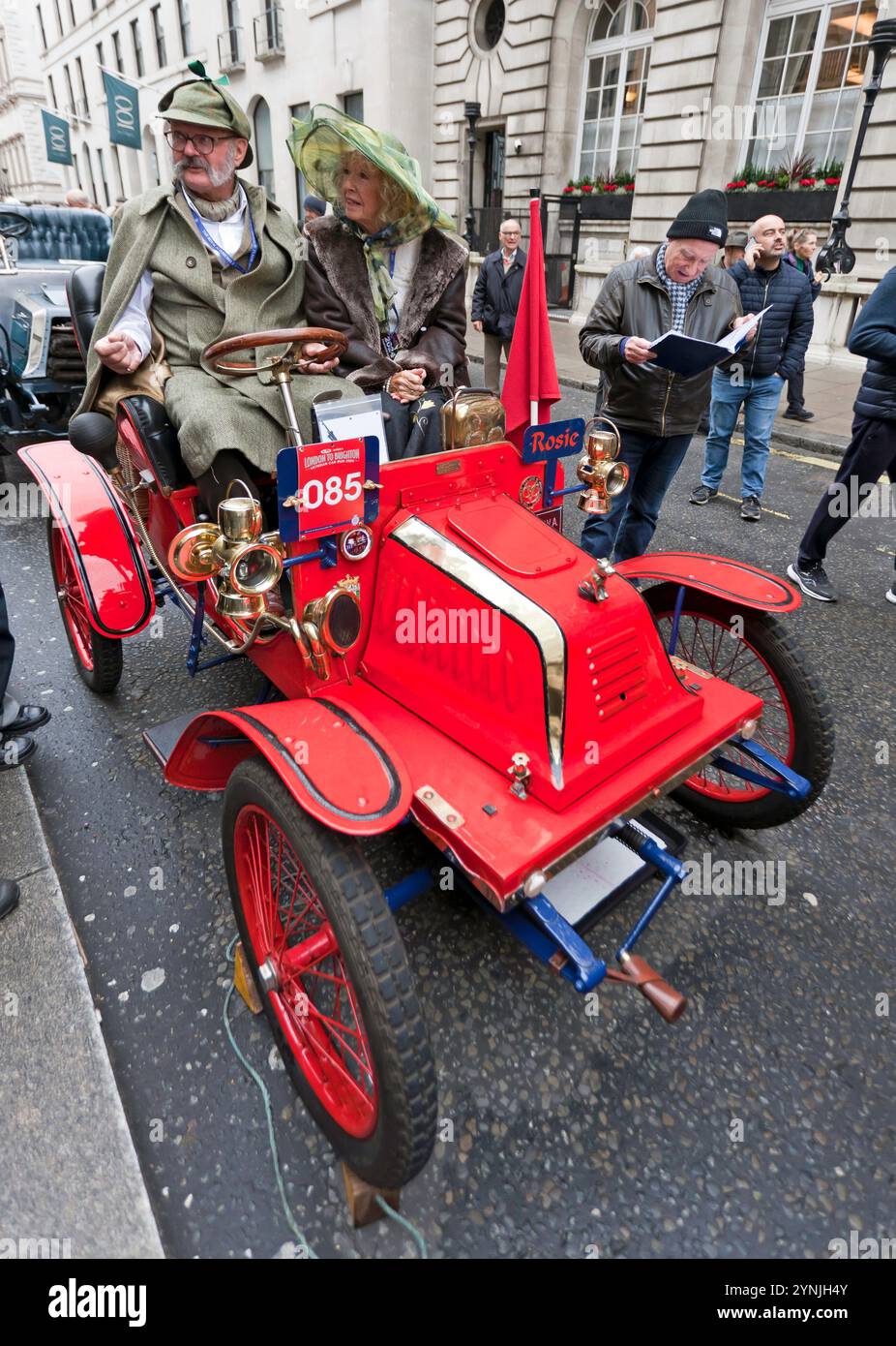 A Couple in Period costume pose in their Red, 1902, Two-Seater, Covert ...