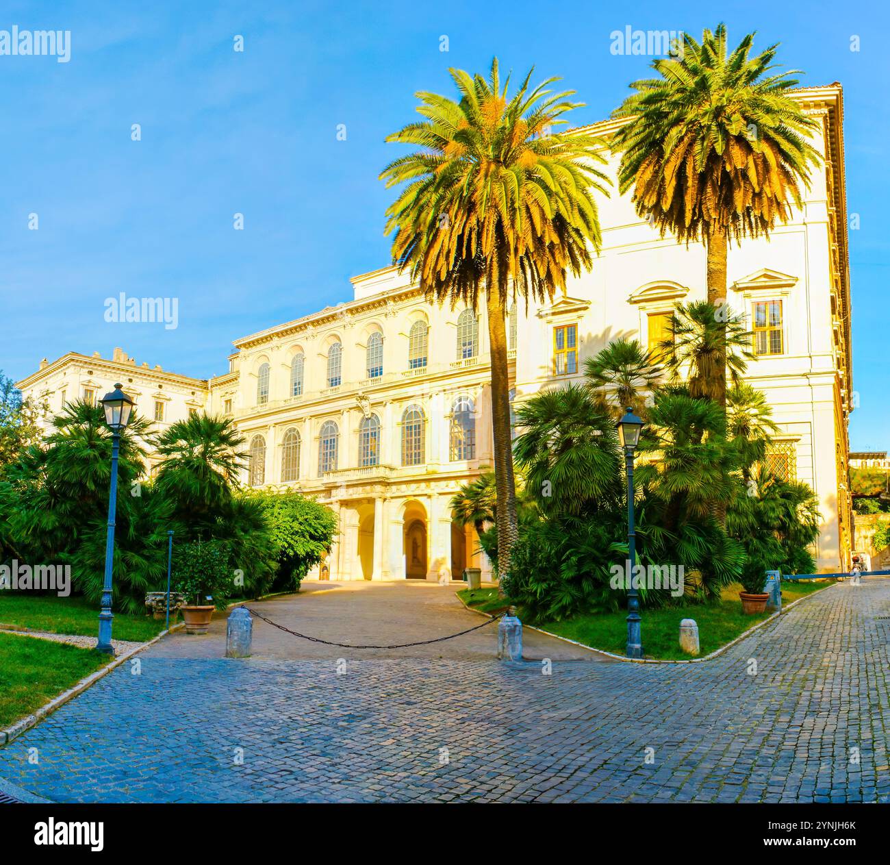 Palazzo Barberini and its gardens with tall palm trees, Rome, Italy ...