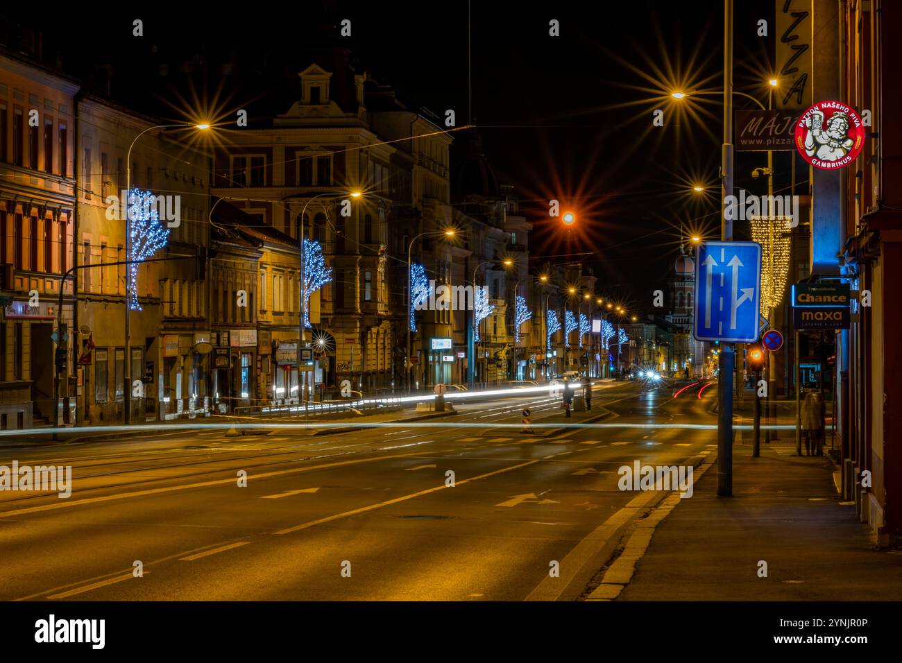 Car light lines in streets of west Bohemia city in evening in Plzen CZ ...