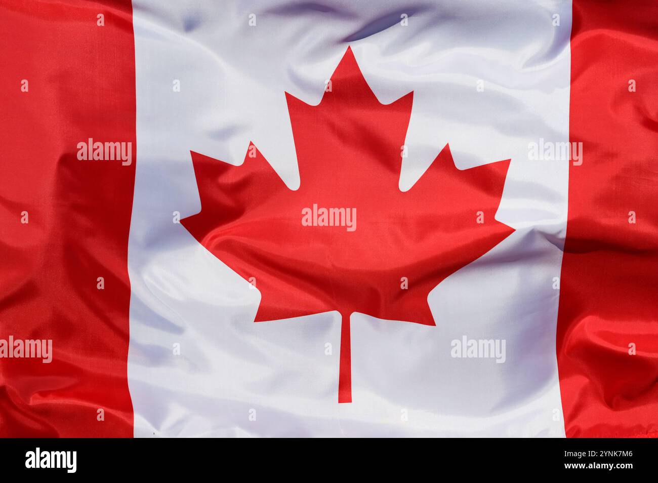 Close-up of the national flag of Canada, fluttering in the wind with ...