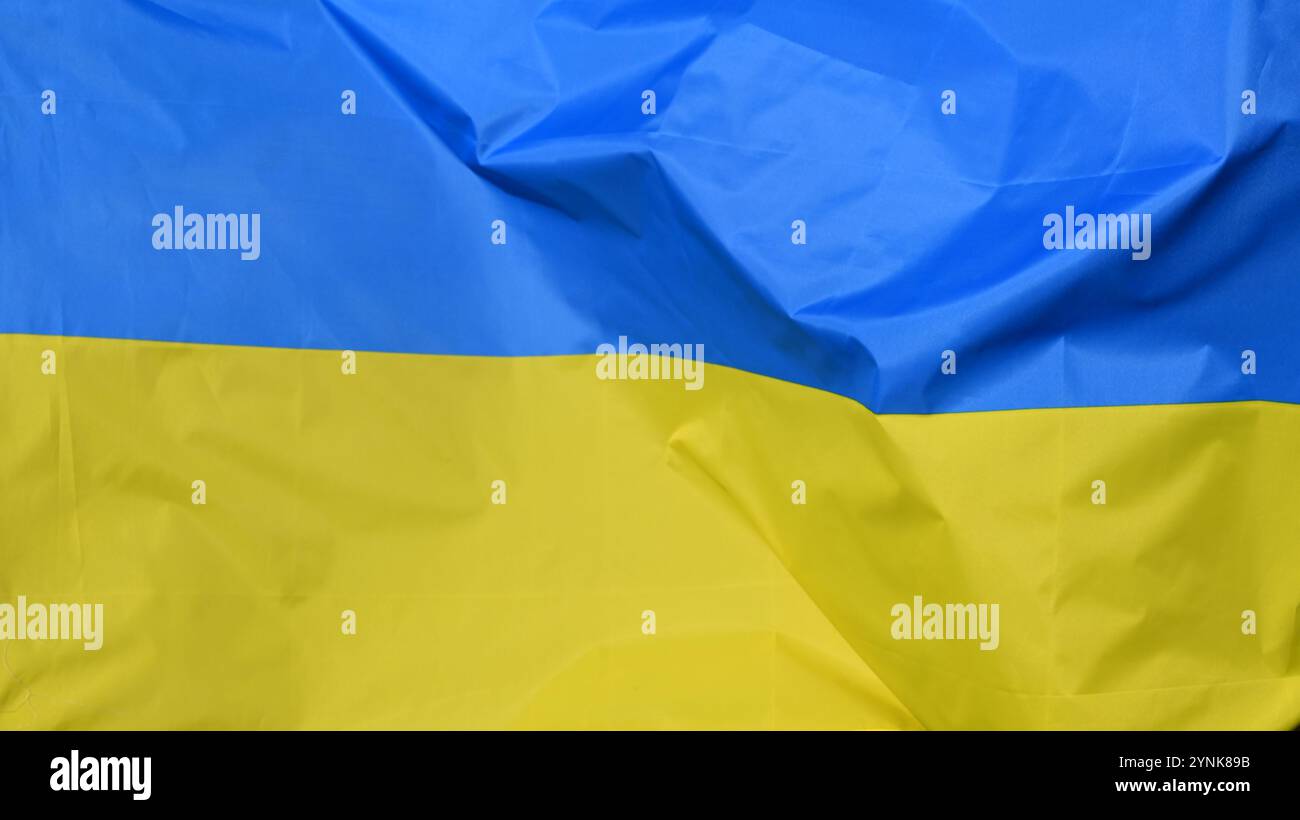 Close-up of the national flag of Ukraine, fluttering in the wind with ...