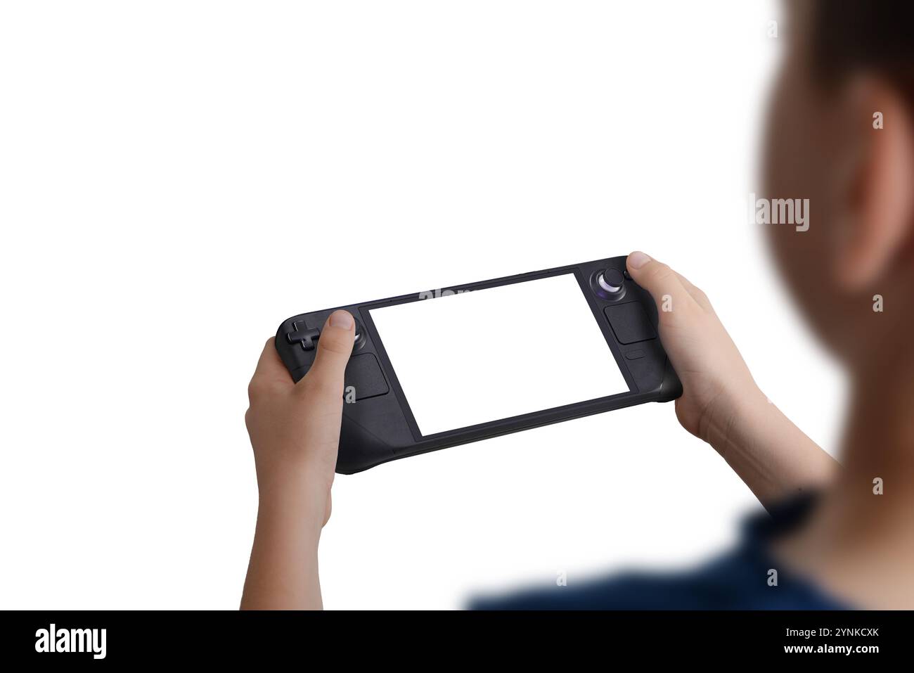 Over the shoulder view of a boy holding a handheld gaming console with ...