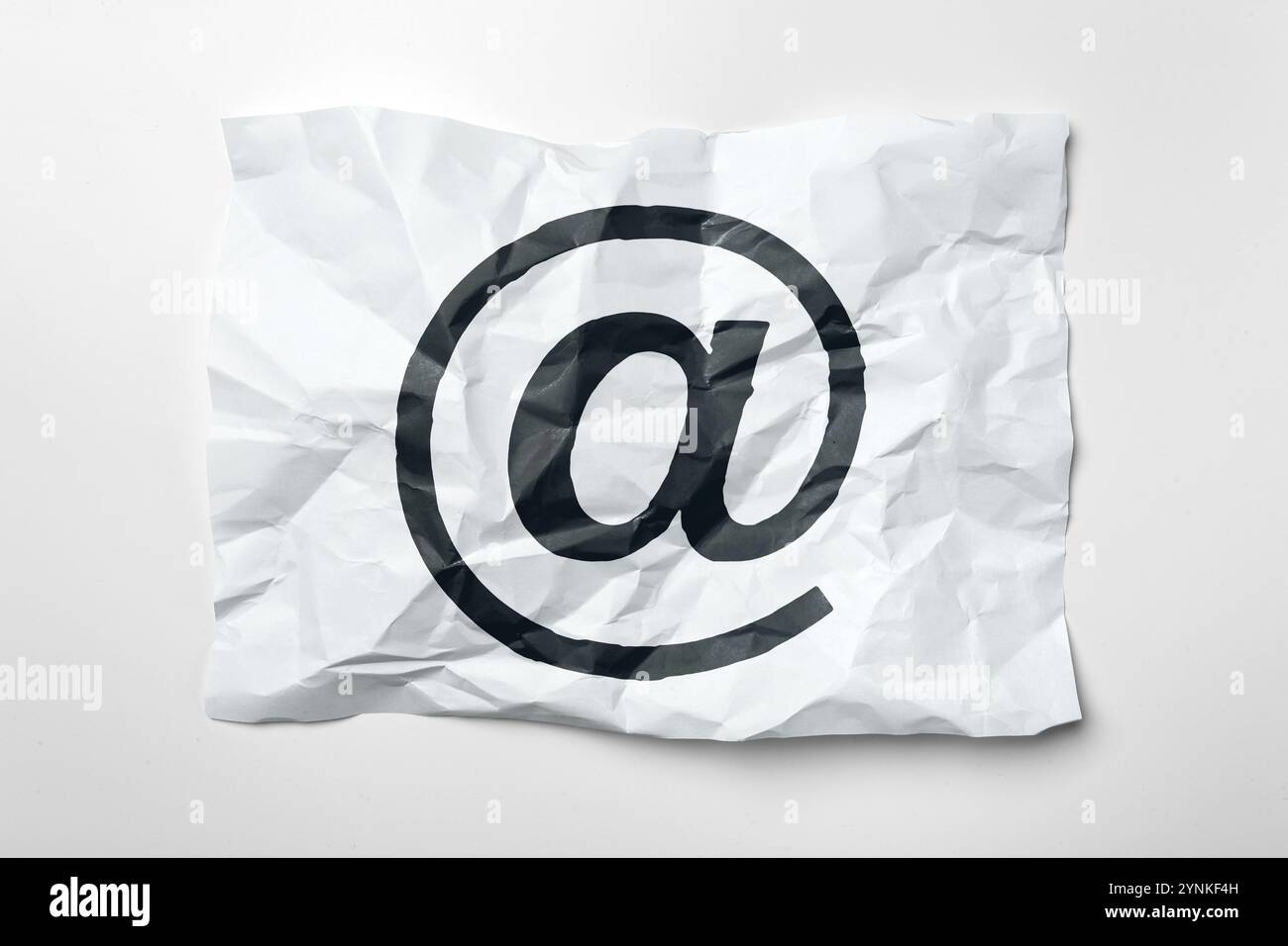 E-mail symbol on crumpled paper Stock Photo - Alamy