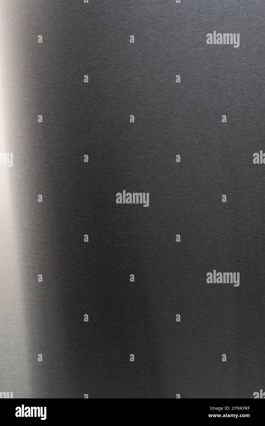 Reflective brushed gray metal material texture background close up view ...