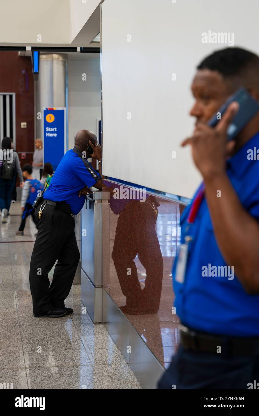Security employees make calls at Hartsfield-Jackson Atlanta ...