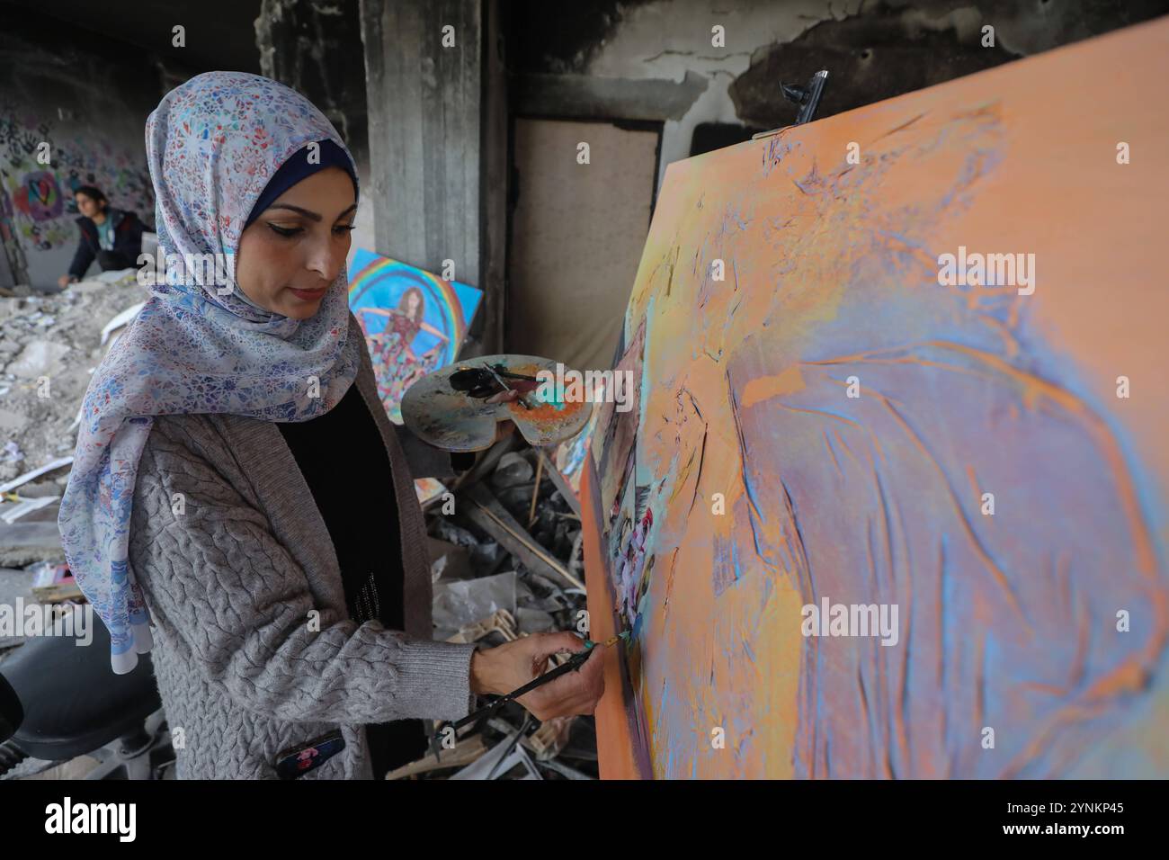 Meysa Youssef, a 40-year-old Palestinian collage artist who lost both ...