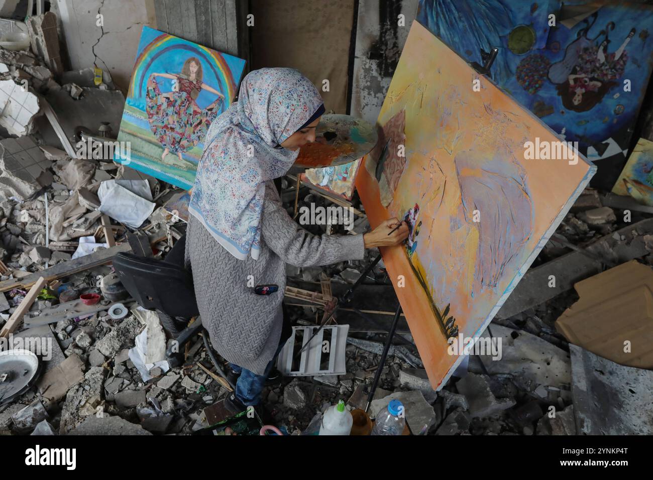 Meysa Youssef, a 40-year-old Palestinian collage artist who lost both ...