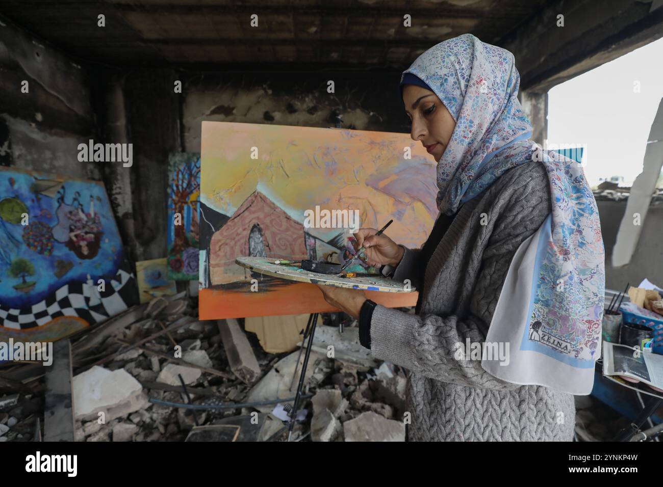 Meysa Youssef, a 40-year-old Palestinian collage artist who lost both ...
