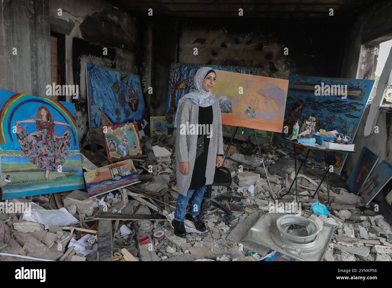 Meysa Youssef, a 40-year-old Palestinian collage artist who lost both ...