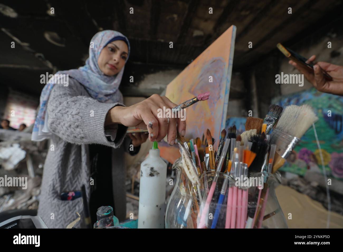 Meysa Youssef, a 40-year-old Palestinian collage artist who lost both ...