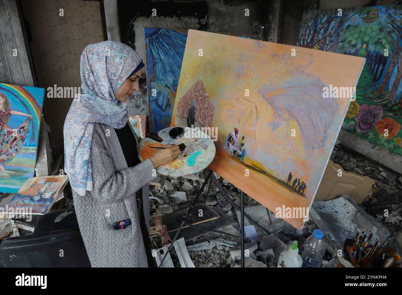 Meysa Youssef, a 40-year-old Palestinian collage artist who lost both ...