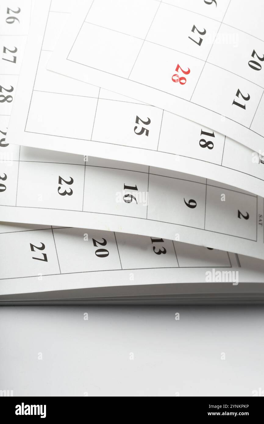 Calendar pages close up business time concept Stock Photo - Alamy