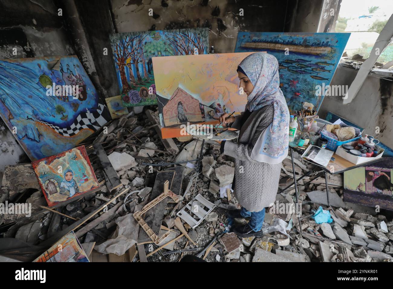 Meysa Youssef, a 40-year-old Palestinian collage artist who lost both ...