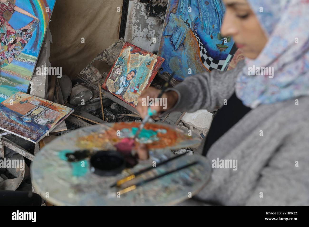 Meysa Youssef, a 40-year-old Palestinian collage artist who lost both ...