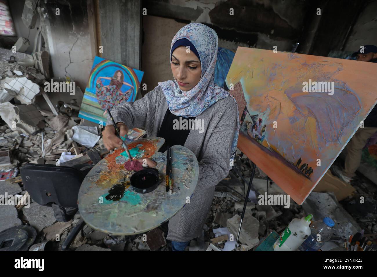 Meysa Youssef, a 40-year-old Palestinian collage artist who lost both ...