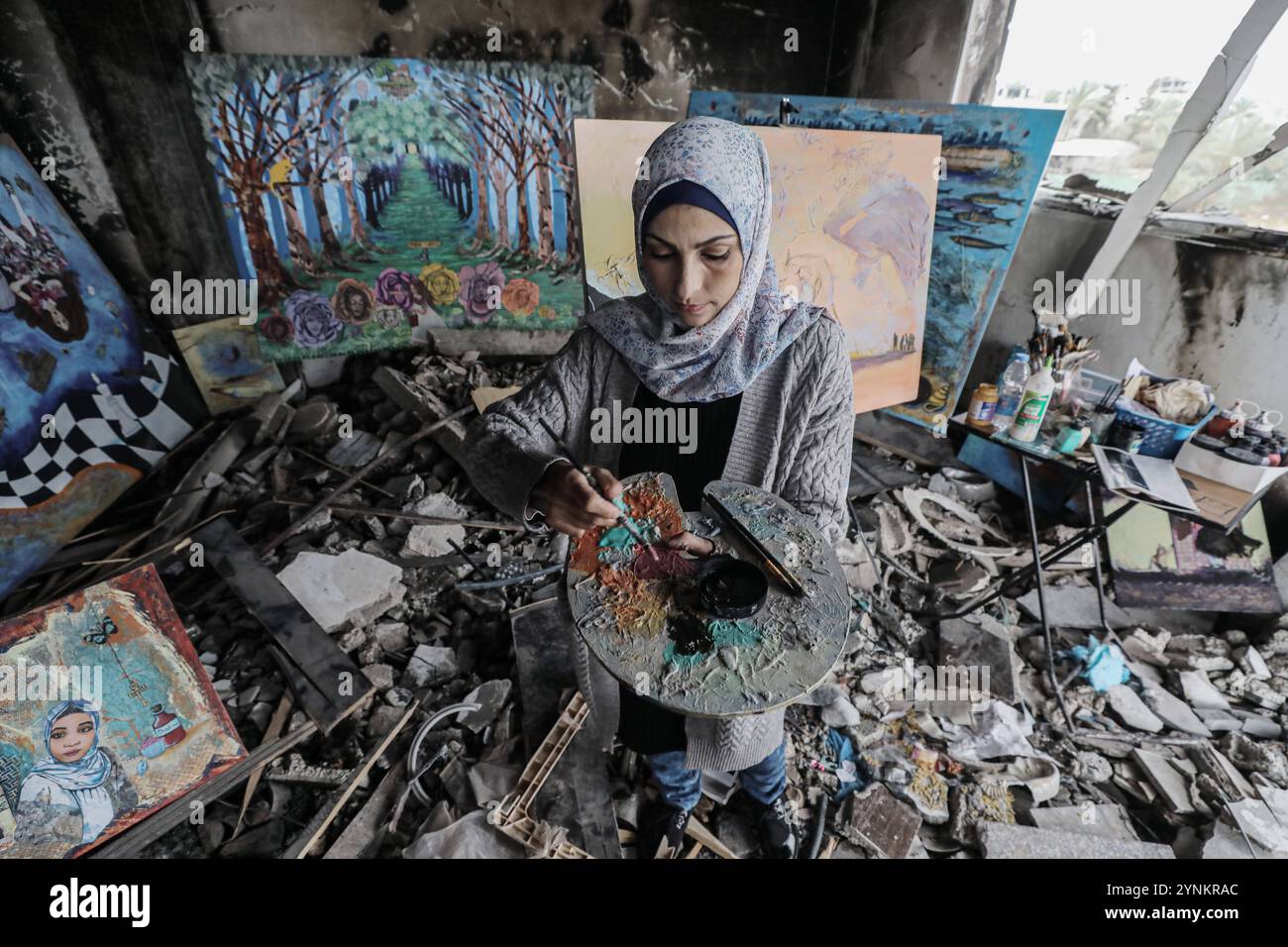 Meysa Youssef, a 40-year-old Palestinian collage artist who lost both ...